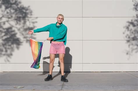 Premium Photo Young Latin Gay Man With Short Blond Hair Dancing With