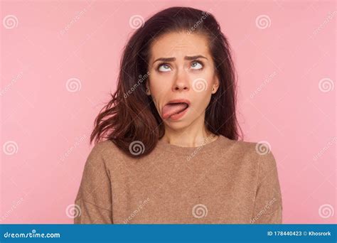 Silly Young Asian Woman Poking And Sqeezing Her Face Pucker Lips Cute