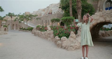 Young Girl Taking Selfies In A Tropical Resort Stock Footage Video Of