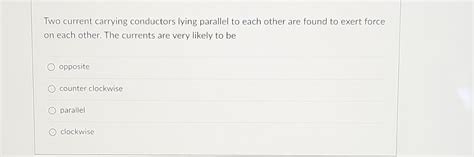 Solved Two Current Carrying Conductors Lying Parallel To Chegg Com