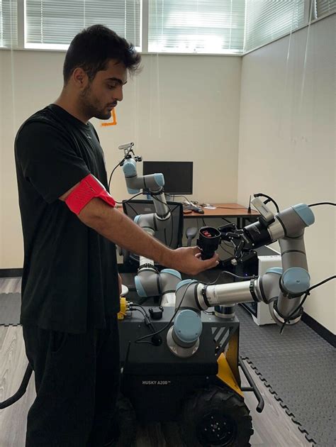 a researcher investigating multi modal robot perception for human robot