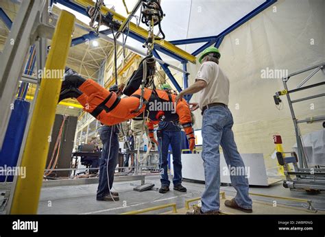 Astronaut Rex Walheim Uses The Active Response Gravity Offload System Argos To Perform Early
