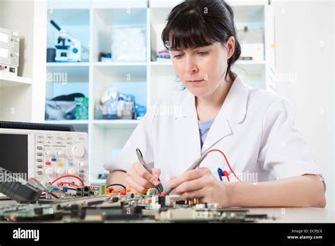 Girl Debugging An Electronic Precision Device Stock Photo Alamy