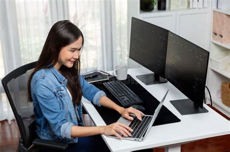 Smiling Asian It Typing Online Software Development On Laptop Stratagem Stock Image Image Of