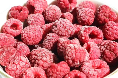 Premium Photo Frozen Raspberries