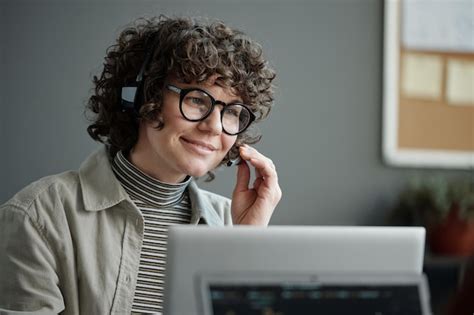 Premium Photo Young Smiling Female It Support Engineer In Headset
