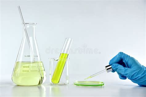 Chemical Reagent Pouring And Mixing Laboratory And Science Experiments Formulating The