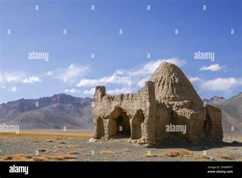 Landscape View Of Ancient Bash Gumbaz Caravanserai Or Chinese Tomb In High Mountain Valley Near Landscape View Of Ancient Bash Gumbaz Caravanserai Or Chinese Tomb In High Mountain Valley Near