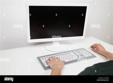 Man Typing On Keyboard Of A Computer Stock Photo Alamy