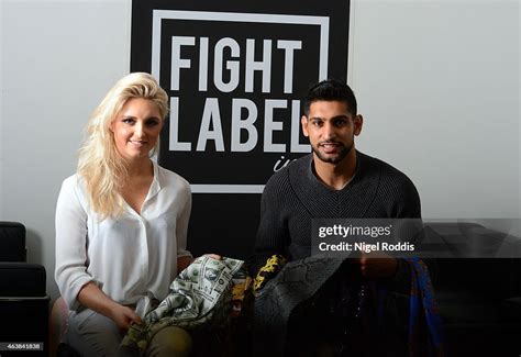 Boxer Amir Khan Poses For A Photograph With Designer Sophie Whittam