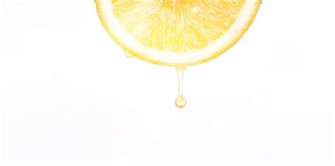 Premium Photo Orange Slice Dripping Juice