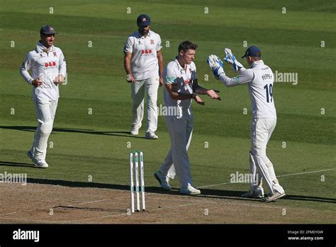 Matt Coles Of Essex Celebrates With His Team Mates After Taking The