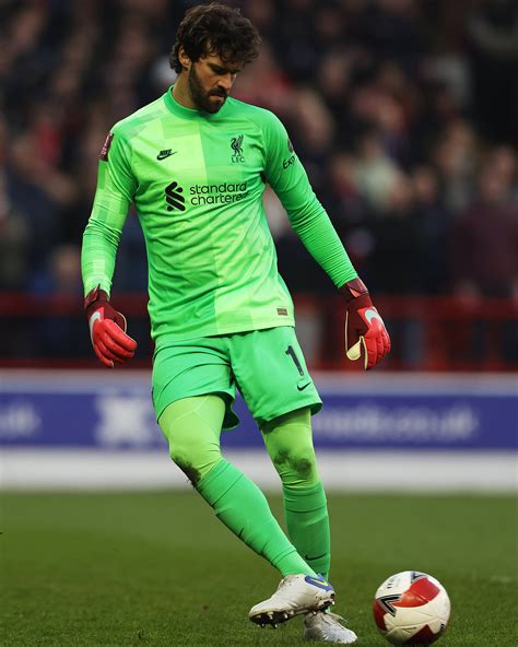 Download Alisson Becker Holding Bottle Up Wallpaper