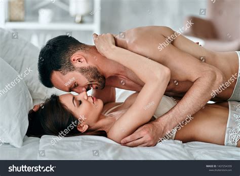 Happy Man Woman Kissing On Bed Stock Photo Shutterstock
