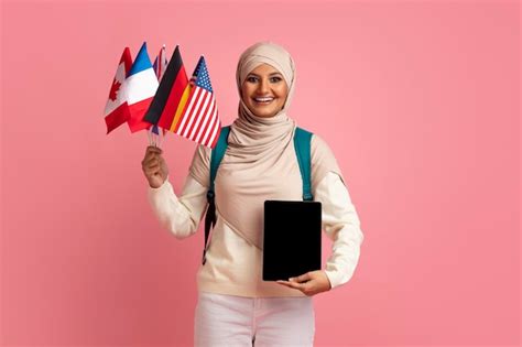 Premium Photo Online Language Courses Muslim Woman Holding