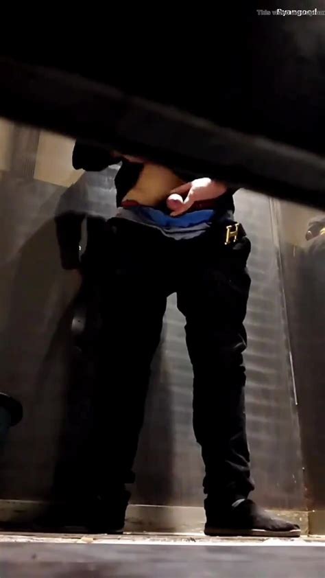 Chinese Guy Caught In Public Restroom