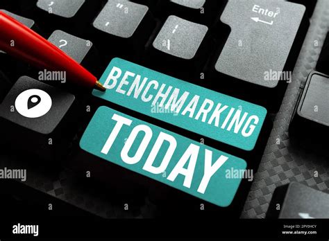 Hand Writing Sign Benchmarking Word For Evaluate Something By