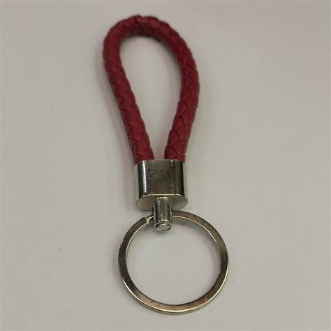 خرید و قیمت جاسوئیچی تسمه ای جیگری طرح دار خودرو Mk اگزوز پرشین سادات اسپرت 110 از غرفه 🟢