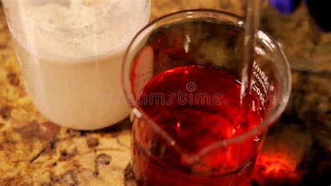 Chemist Mixing Chemicals In Laboratory Stock Footage Video Of Science Experiment 348794102
