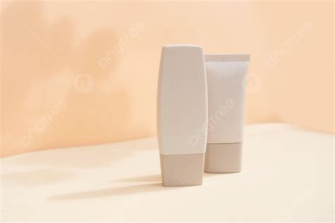 그림자 오버레이가 있는 텍스처 베이지 배경에 두 개의 튜브가 있는 최소한의 최신 화장품 디스플레이 최소 제품 디스플레이 사진 및 무료 다운로드를위한 그림 Pngtree