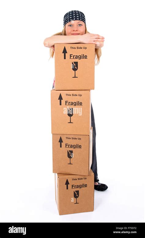 Girl With A Stack Of Cardboard Boxes Stock Photo Alamy