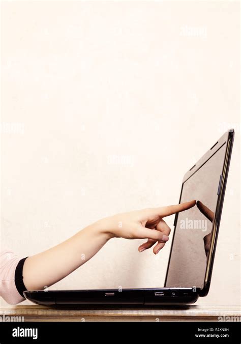 Technology Internet Modern Lifestyle Female Finger Touching Screen Of Computer Laptop Showing