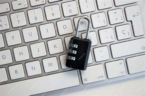 Premium Photo A Padlock Sits Next To A White Keyboard Security Computer Vulnerability Concept