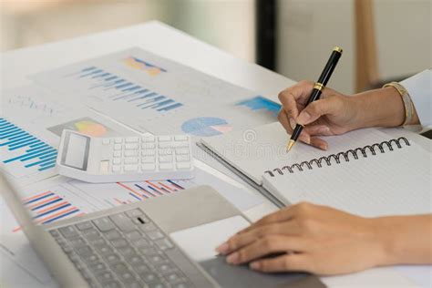 Businessman Hands On Keyboard Of Laptop Computer Showing Data Analysis