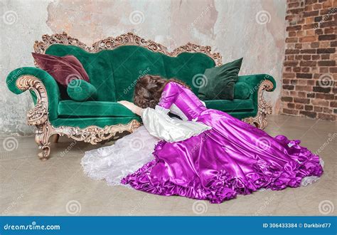 Young Beautiful Sad Crying Woman In Fantasy Rococo Style Medieval Dress