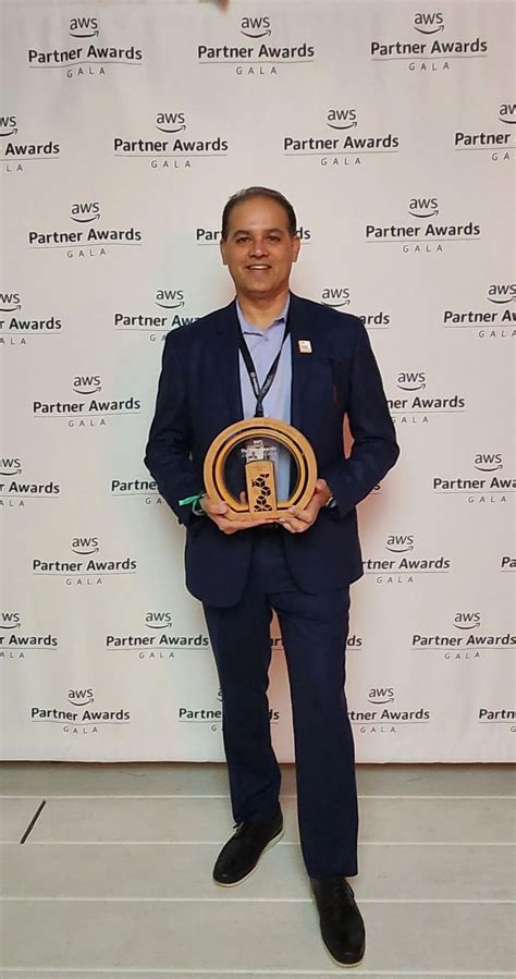 honored to accept the aws industry partner of the year 2024 award for