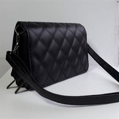 خرید و قیمت کیف رو دوشی دوزیب اسپرتزنانه ودخترانه،چرم صنعتی گلدوزی