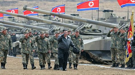 Kim Jong Un In Leather Jacket Drives North Koreas New Tank In Mock