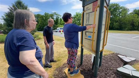 Seniors Embrace New Outdoor Fitness Equipment And Walking Life Trail
