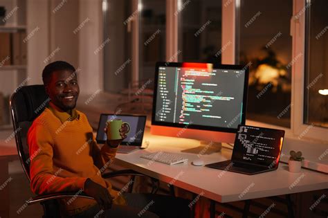 Premium Photo Portrait Of Contemporary African American Man Writing Code And Looking At Camera
