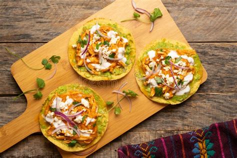 Chicken Tinga Tostadas With Cheese And Avocado Mexican Food Stock