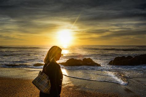 People Walking On The Beach Sunset