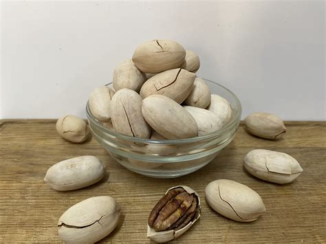 Пекан в скорлупе Китай — 500 гр купить в Москве с доставкой на дом в интернет магазине