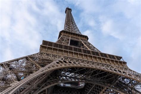 Premium Photo The Eiffel Tower Is A Tall Metal Structure With A Lattice Design
