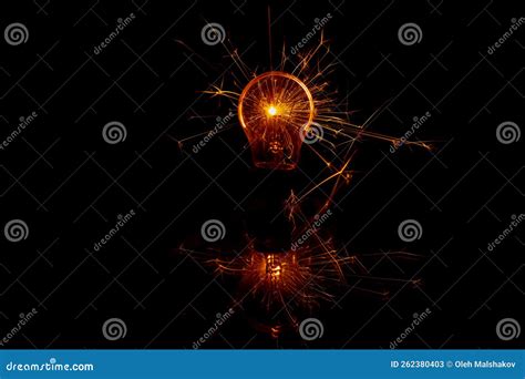 Incandescent Lamp With Sparks On A Black Background Stock Image Image Of Heat Electricity