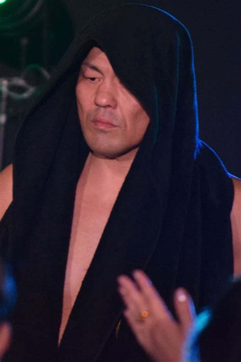 Download Professional Wrestler Minoru Suzuki Preparing For The Match With Intensity