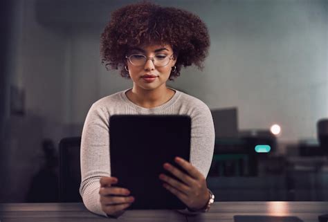 Premium Photo Tablet Programmer And Woman In Night Office Research Or
