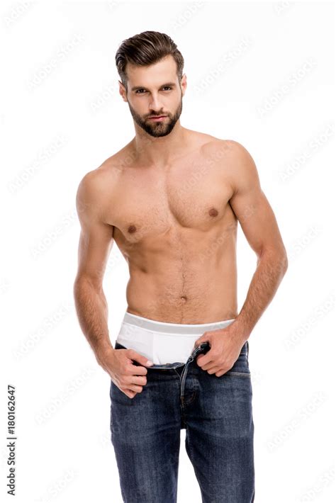 Time To Undress Handsome Shirtless Young Man Looking At Camera And