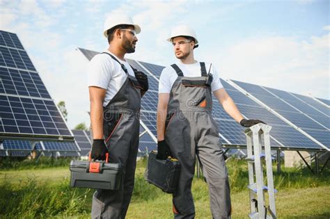 Engineering Team Working On Checking And Maintenance In Solar Power Plant Solar Panel