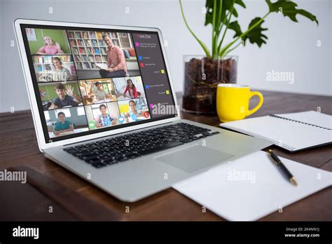 Smiling Diverse Elementary School Pupils During Class On Laptop Screen