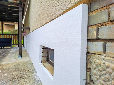 Installing Rigid Styrofoam Insulation Board For Energy Saving Of The