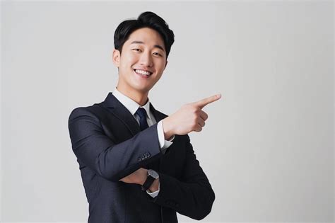 Premium Photo A Man In A Suit Pointing At Something
