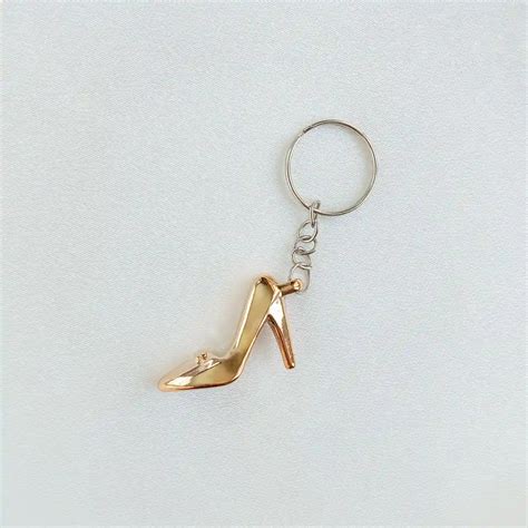 آویز کیف و جاسوئیچی کفش زنانه 1102 دیلیپو خرید جدیدترین کیفهای قیمت مناسب زنانه و دخترانه