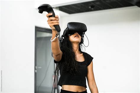 South East Asian Girl Playing Vr Game By Stocksy Contributor Irina Efremova Stocksy