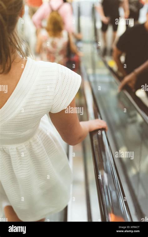 Woman Using An Escalator In Metro Stock Photo Alamy