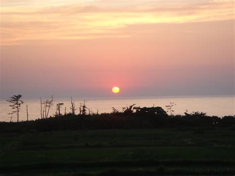 日本海に夕日が沈む風景 石川県羽咋郡志賀町高浜町 快適賃貸アパート生活 Toriko ハイツ浜の内